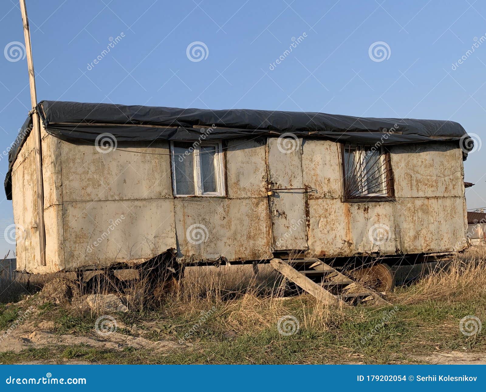 Home Made House for the Poor. Mobile Housing for Builders. Old Rusty ...