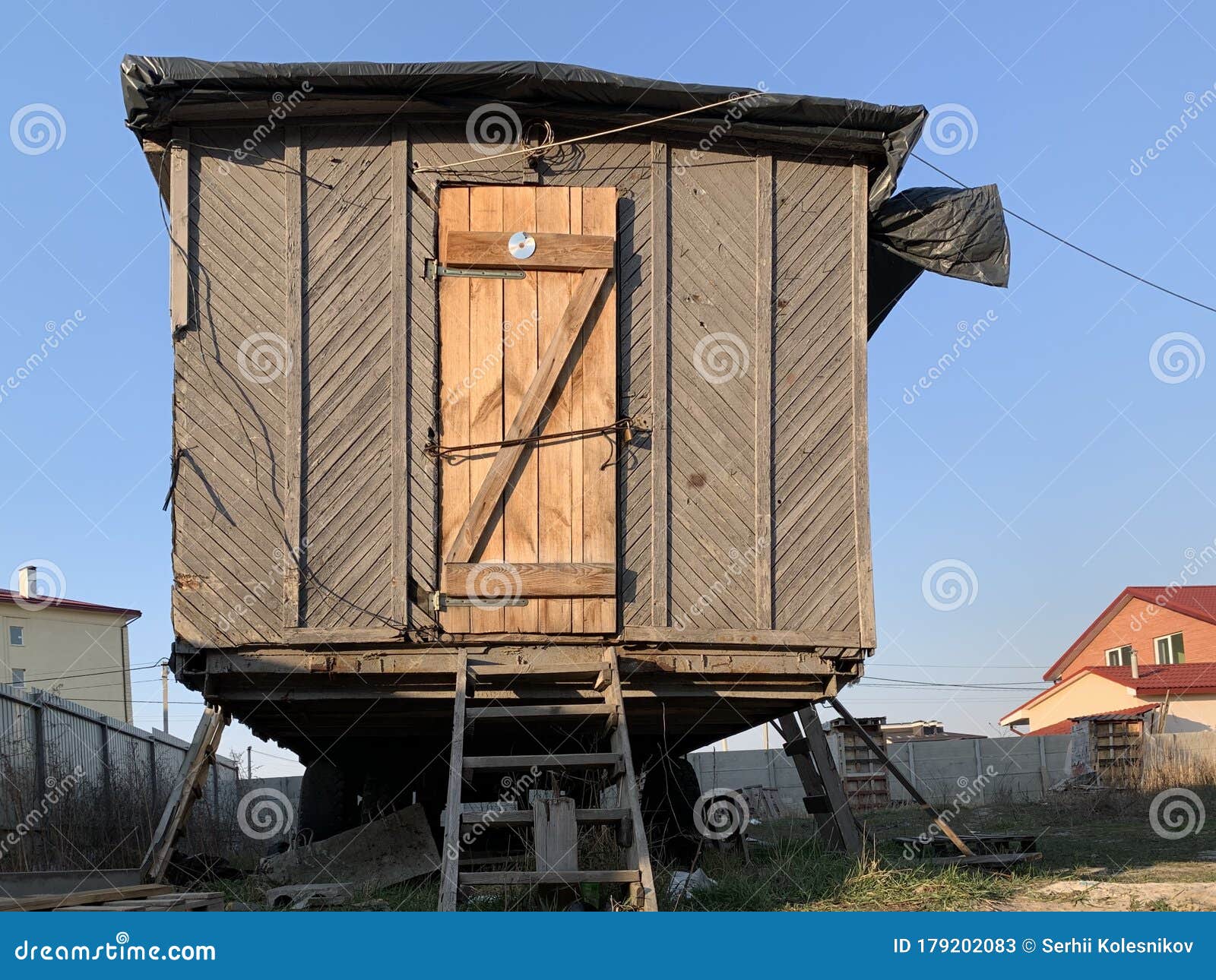 Home Made House for the Poor. Mobile Housing for Builders. Old Rusty ...