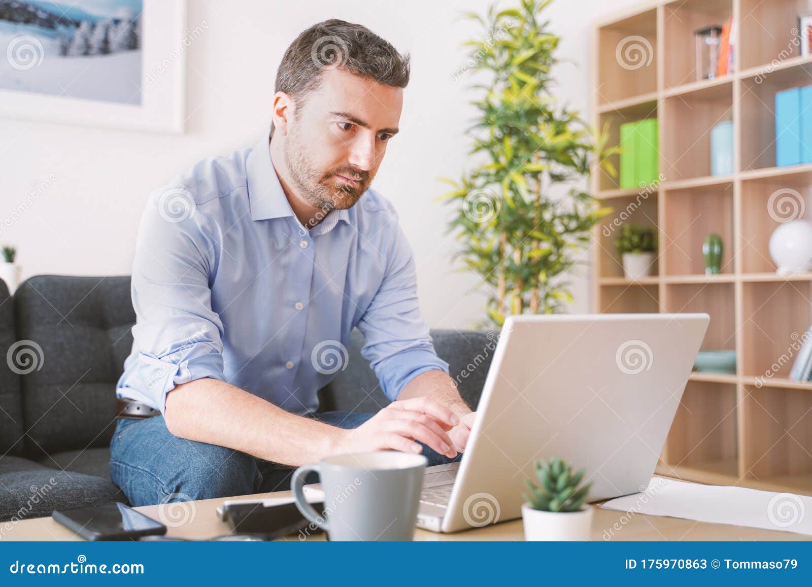 One Guy Working from Home Using Internet Connection Stock Image - Image ...