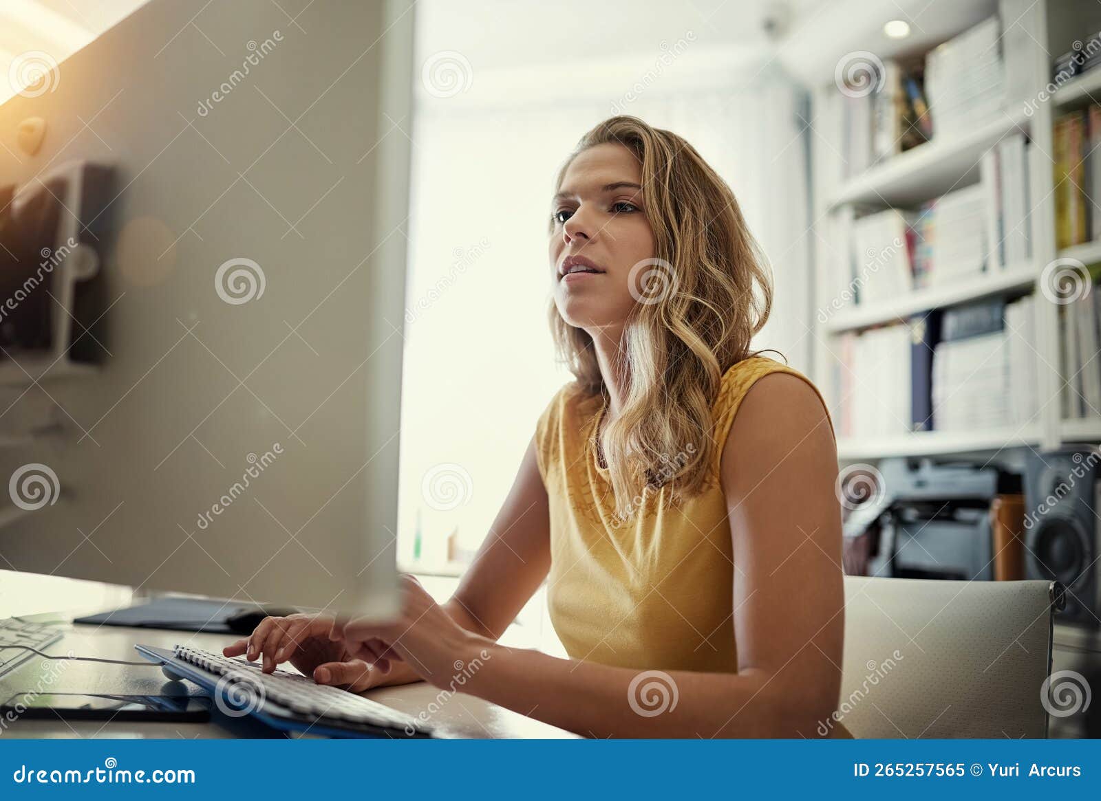 The Home Office is always Productive. a Young Woman Working on a ...
