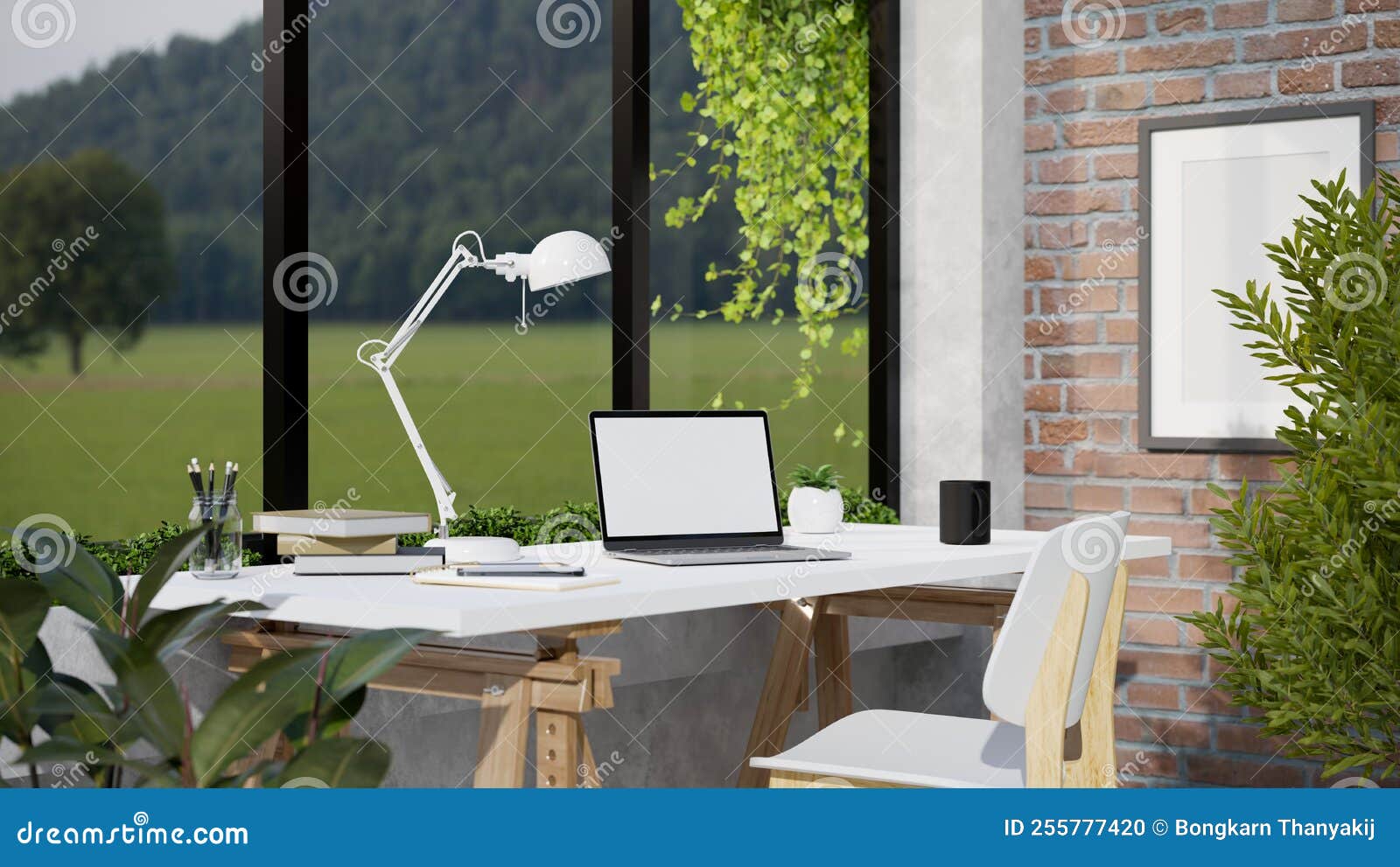 Home Office Studio with Laptop on Working Table Against the Window with ...