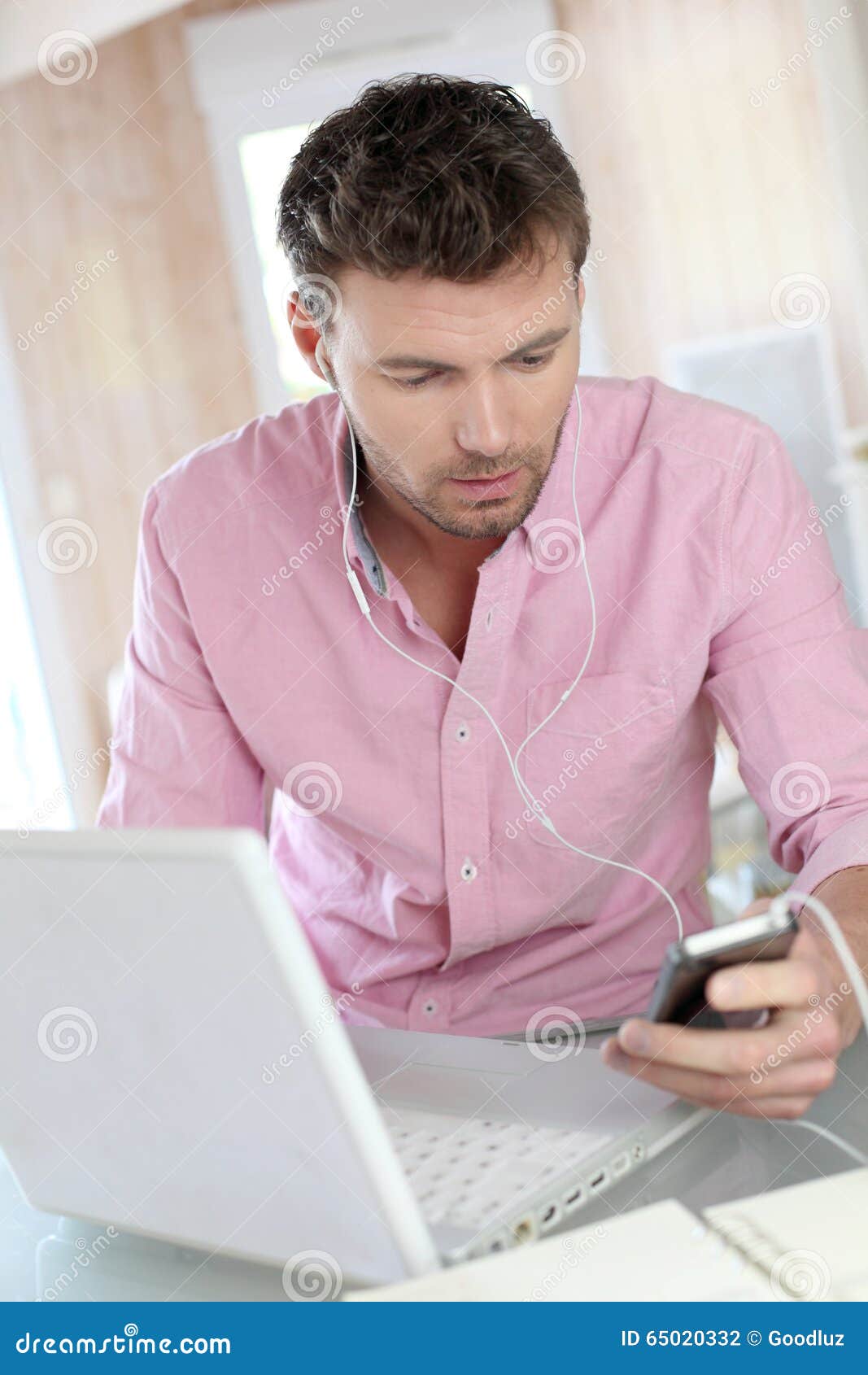 Home-office Worker Using Laptop and Phone Stock Photo - Image of ...