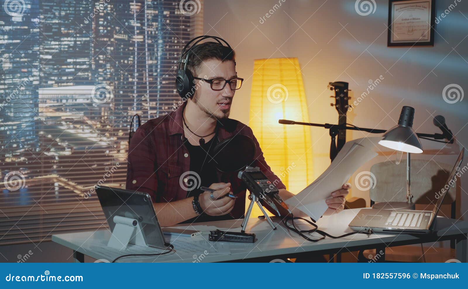 Home Recording Studio: the Speaker in Headphone Reads the Story into ...