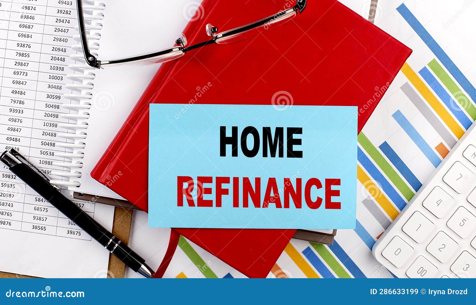 HOME REFINANCE Text on a Sticky on Red Notebook on Chart Background ...