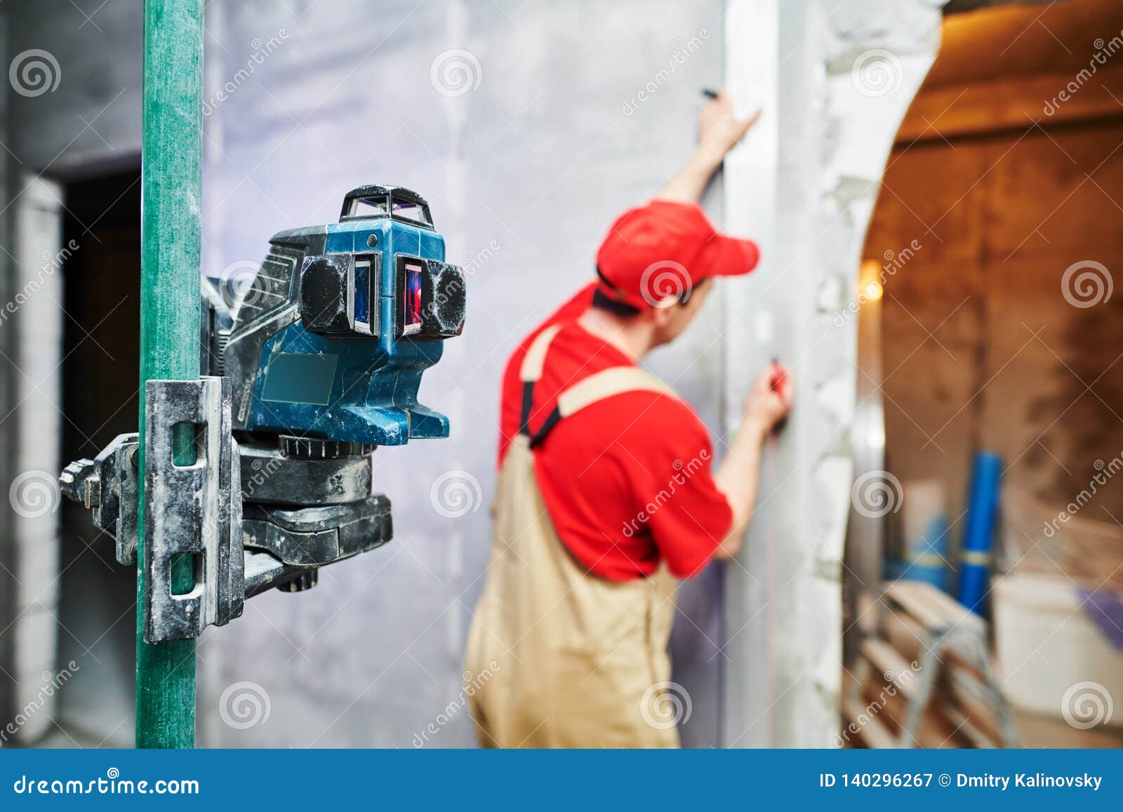 Home Renovation Worker Measure and Mark by Line Laser Stock Image ...