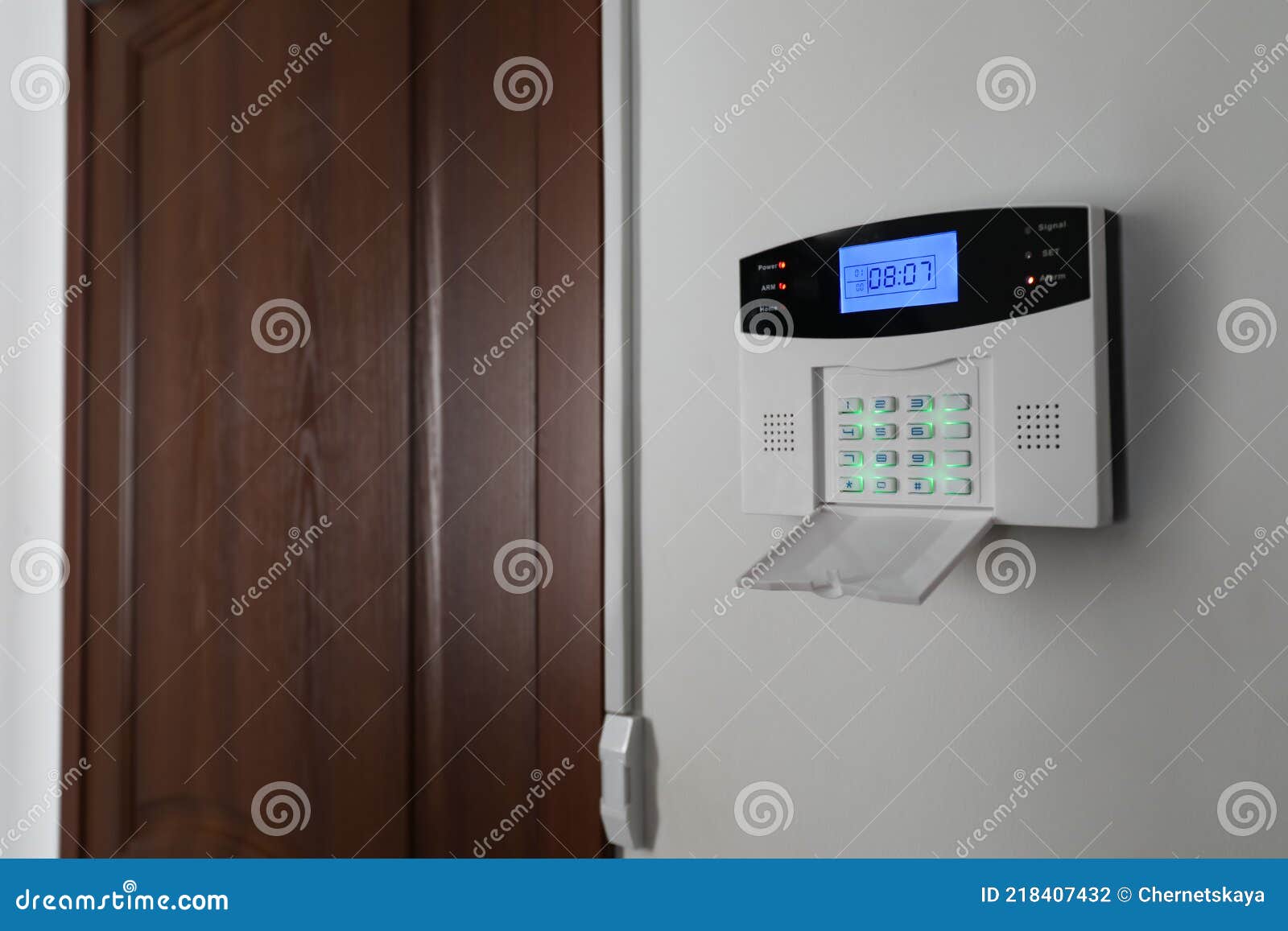 Home Security Alarm System on White Wall Near Door, Space for Text ...