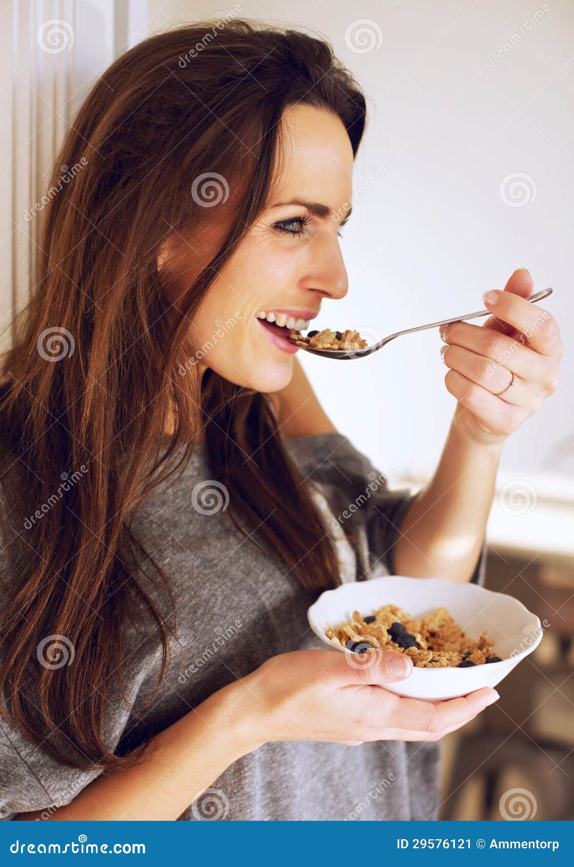At Home with Smiling Woman Eating Breakfast Stock Image - Image of ...