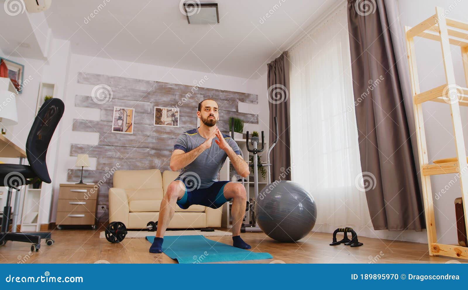 Home squat workout stock photo. Image of exercising - 189895970
