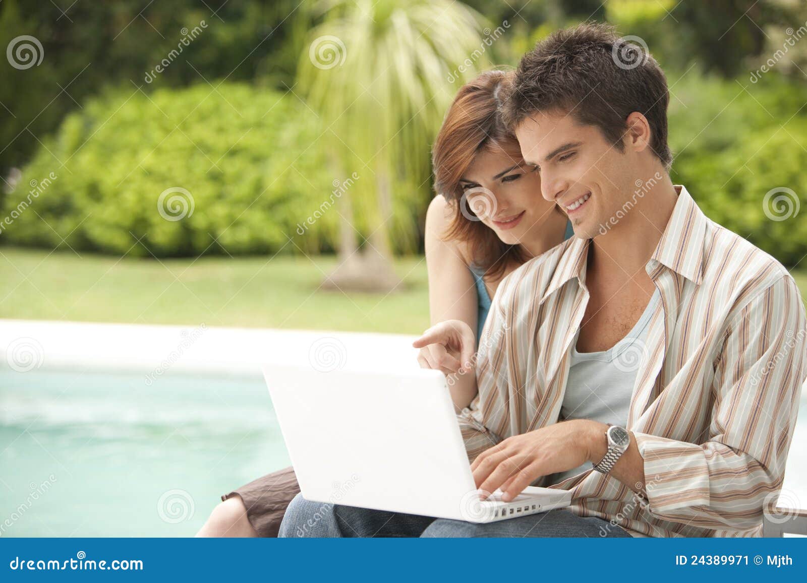 Home Tech Couple with Laptop by Pool Stock Image - Image of house ...