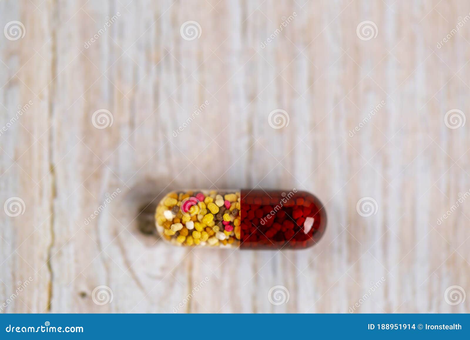 Home Therapy. One Red Clear Capsule of Microgranules Stock Photo ...