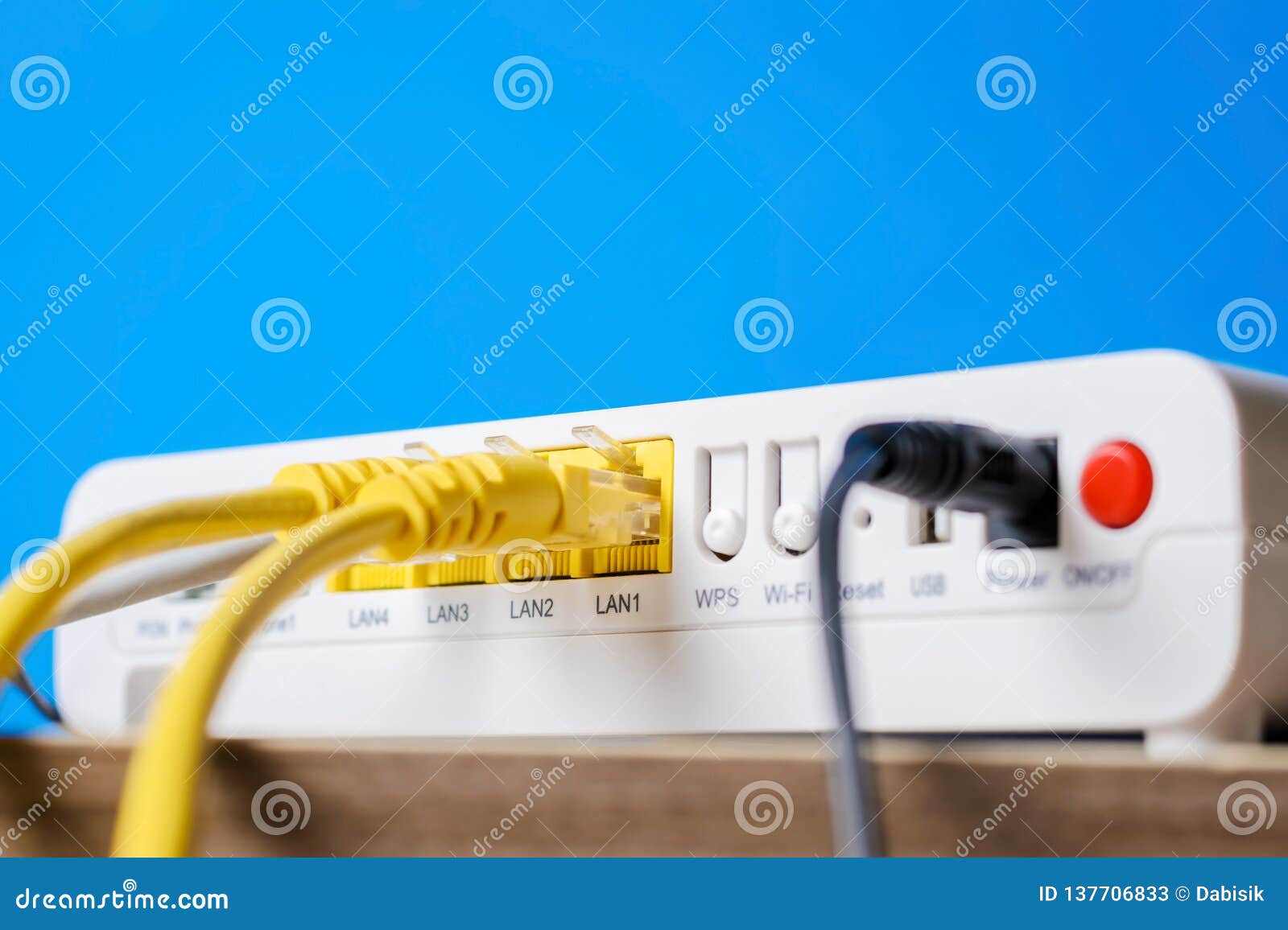 Home Wireless Router with Ethernet Cables Plugged in, Closeup Stock ...
