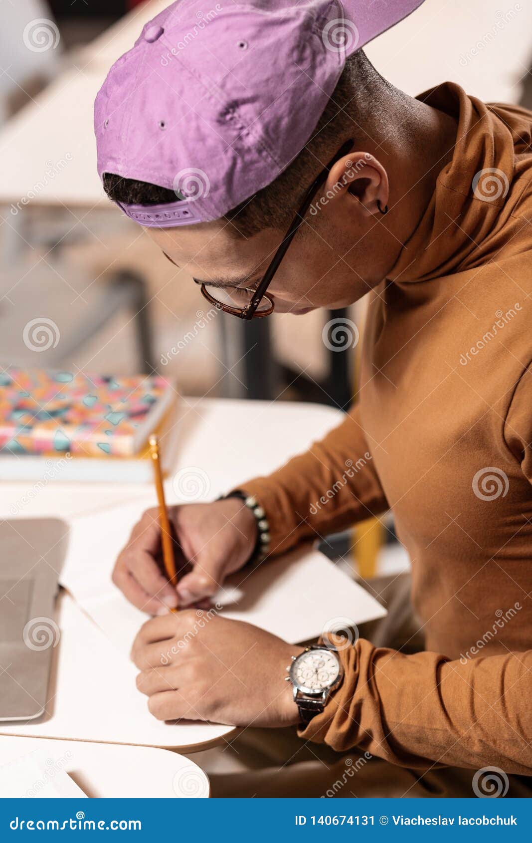 Student Preparing for Classes at University while Sitting in the ...