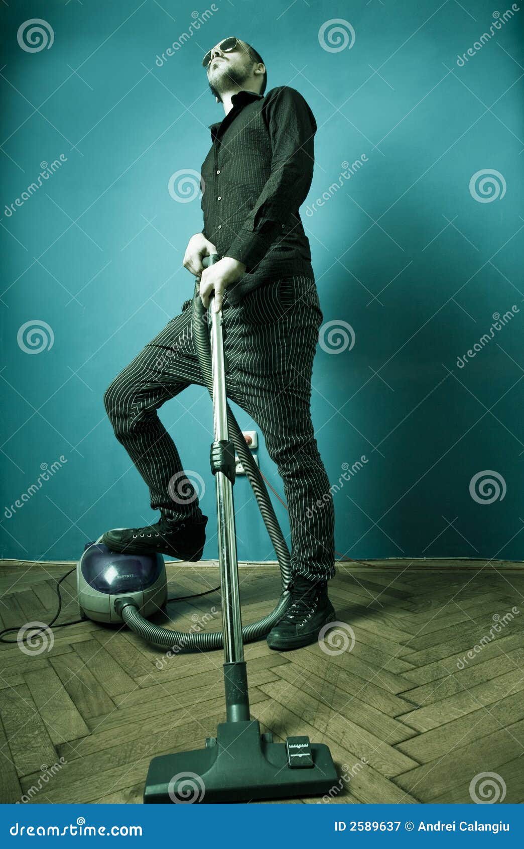 Homeboy vacuuming stock image. Image of pose, homeboy - 2589637