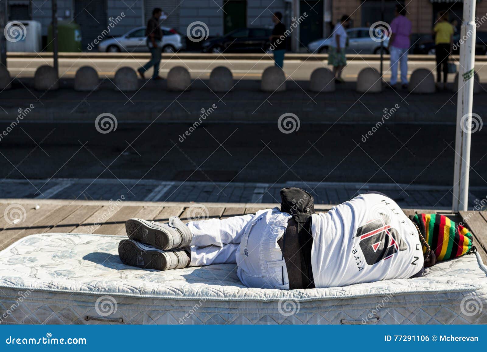 A Homeless Black Man Asleep on the Old Sofa in the Street Editorial ...