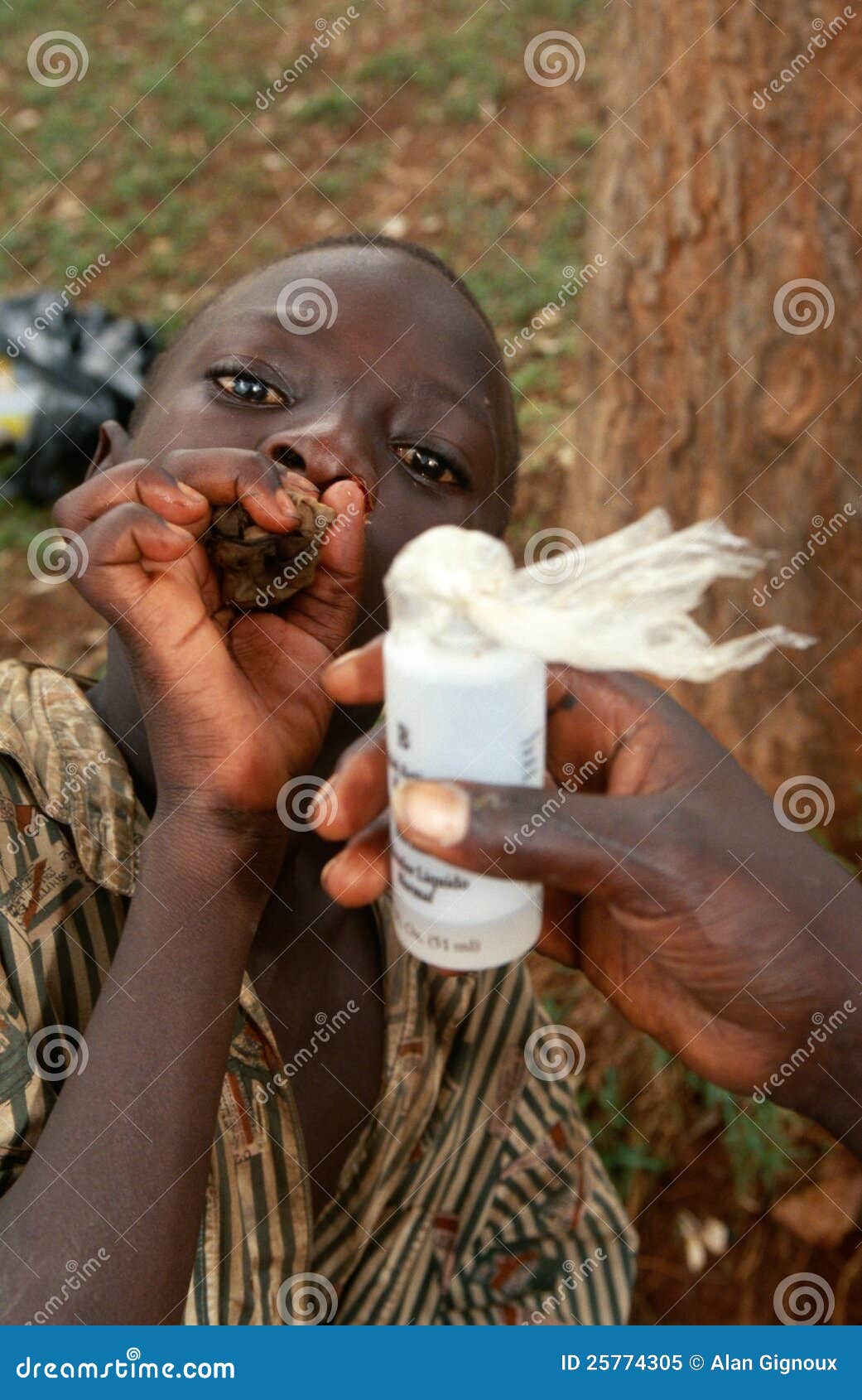 A Homeless Boy Sniffing Glue in Kampala, Uganda Editorial Image - Image ...