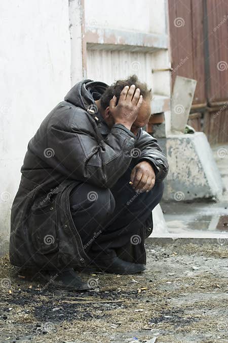 Homeless man in depression stock image. Image of arms - 4018103