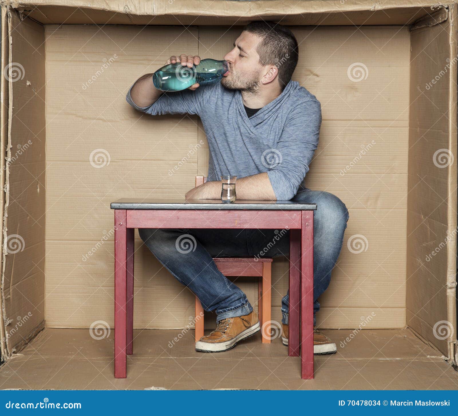 Homeless Man Drinking Alcohol from a Bottle Stock Photo - Image of ...