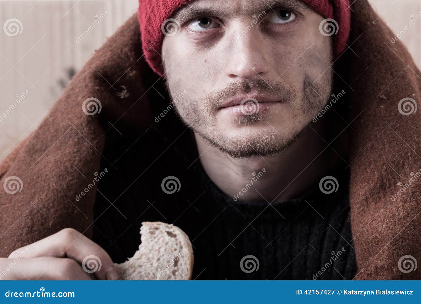 Homeless Man Eating a Piece of Bread Stock Image - Image of homeless ...