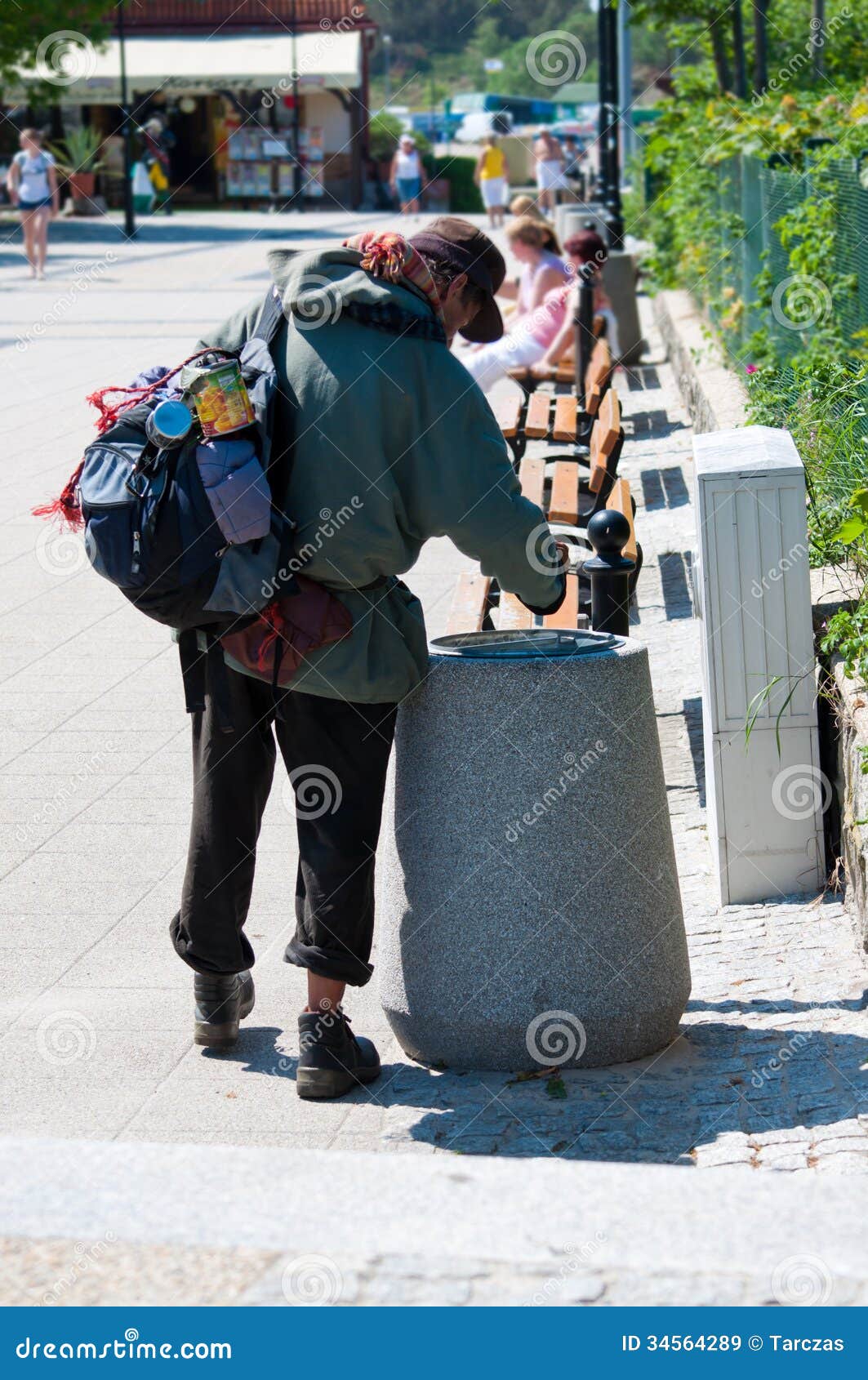 Homeless Man Looking for Food in the Trash Stock Image - Image of ...