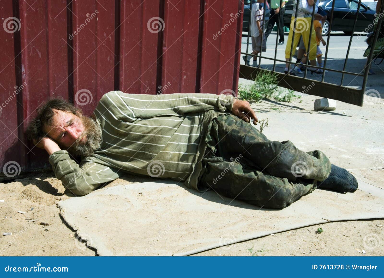 Homeless Man Lying on a Sidewalk Stock Photo - Image of beggar, despair ...