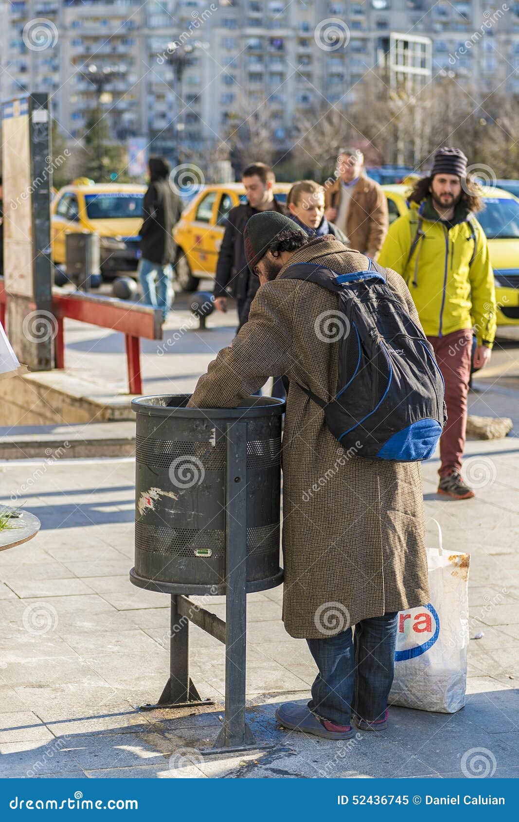 Homeless Old Man In Search For Food. Poor Tramp Hungry, Rummaging For ...