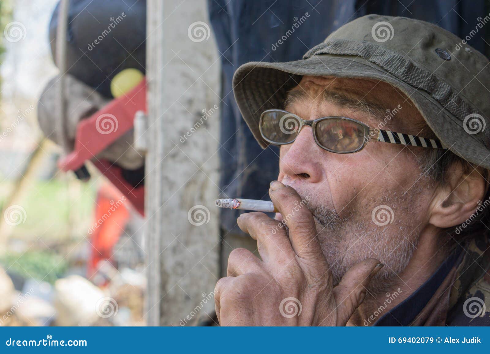 Homeless man smoking stock image. Image of beard, lifestyle - 69402079