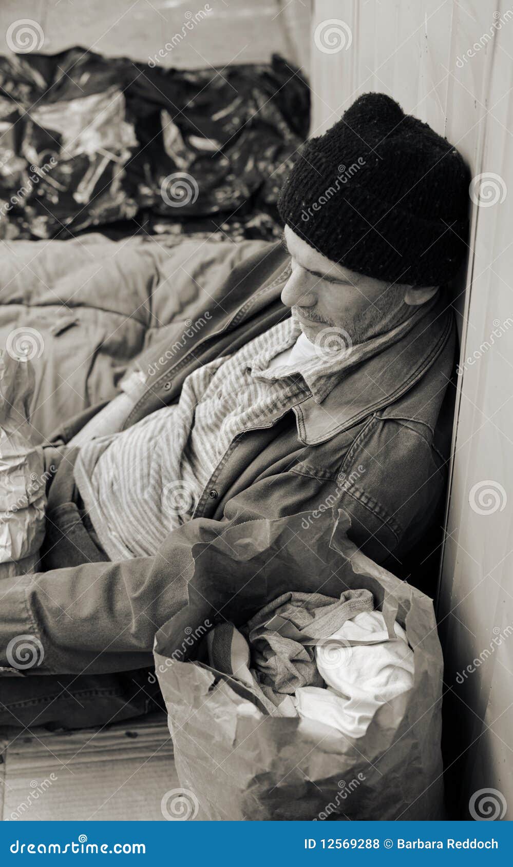 Homeless Man on the Street stock photo. Image of poverty - 12569288
