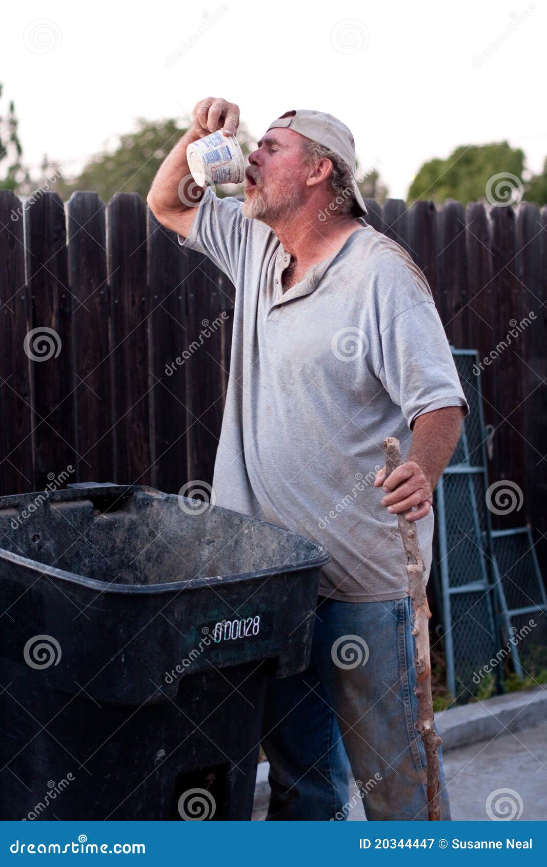 Homeless man trash picking stock image. Image of poverty - 20344447