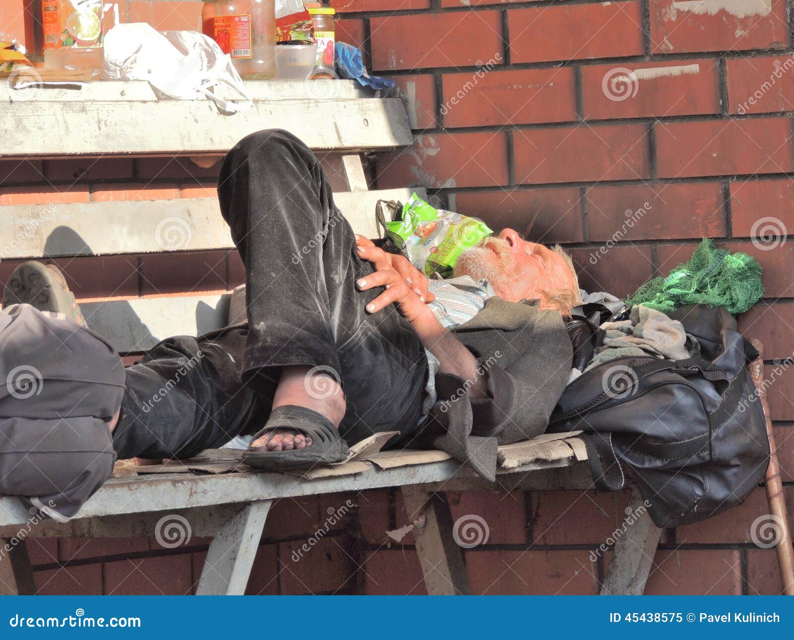 Homeless Man Sleeping on a Bench. Editorial Image - Image of bench ...