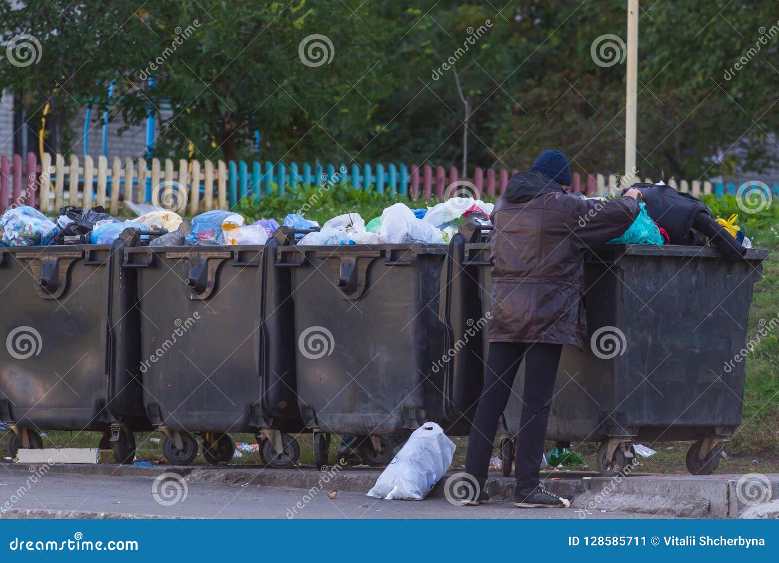 Homeless People Near the Garbage Cans Stock Image - Image of recycling ...
