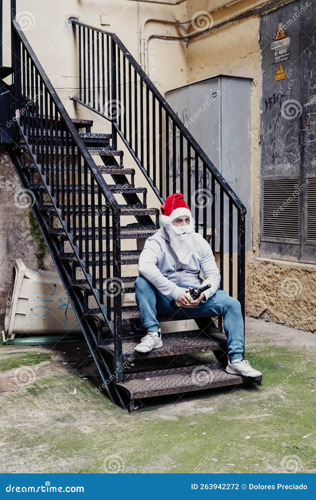 Homeless Santa Drinking Wine And Rummaging Through Garbage Bins Royalty ...