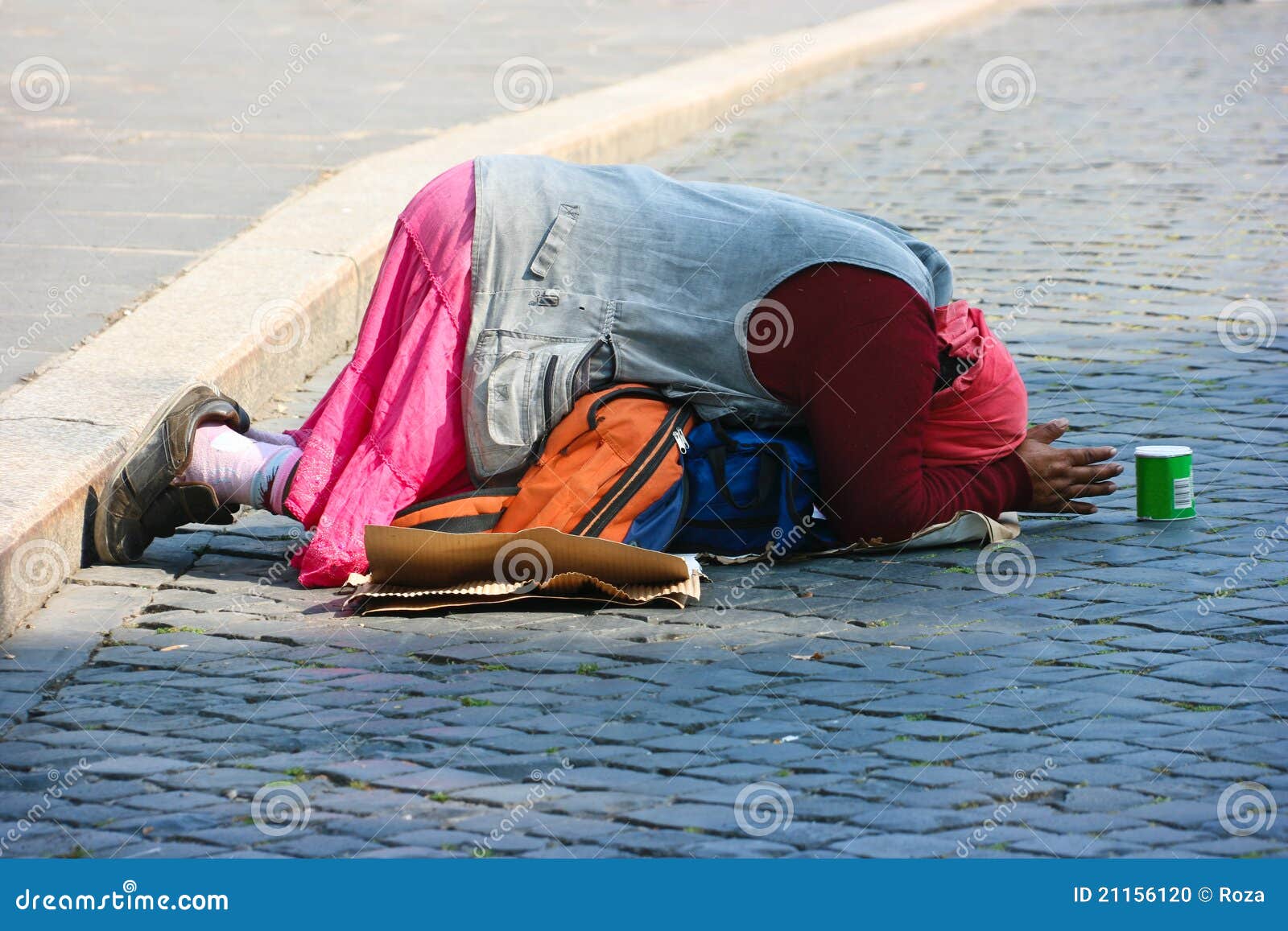 Homeless Woman Sleeping On A Park Bench Next To A Wheelchair. Stock ...