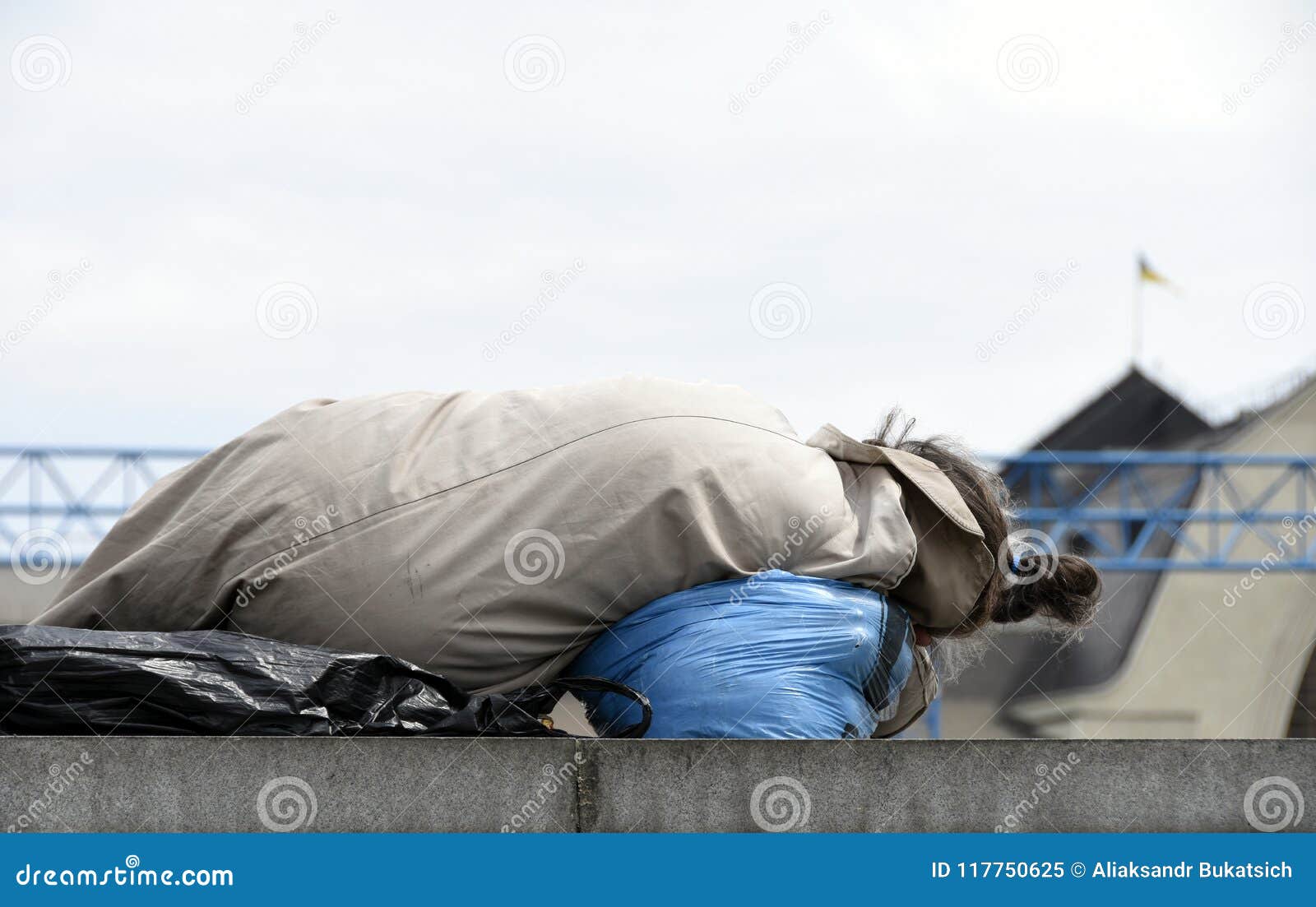 A Homeless Woman Sleeps on Bags at a Train Station in Kiev Stock Image ... A Homeless Woman Sleeps on Bags at a Train Station in Kiev Stock Image ...
