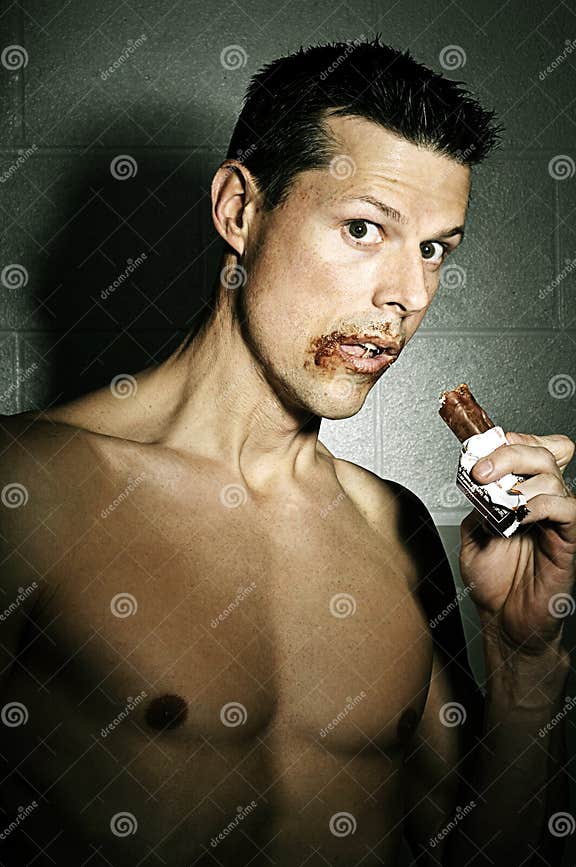Homem Apto Travado Comendo Doces Imagem de Stock - Imagem de corpo ...
