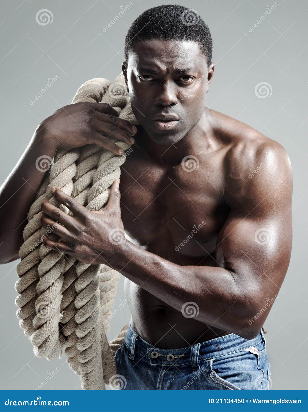 Homem forte no estúdio foto de stock. Imagem de ajuste - 21134450