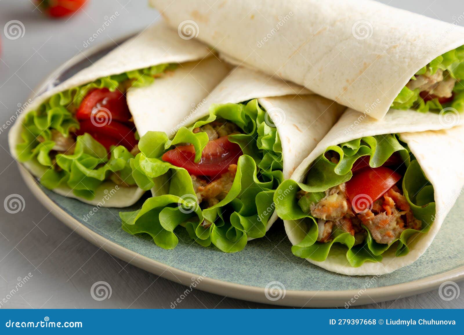Homemade Avocado Tuna Wraps on a Plate , Side View Stock Photo - Image ...