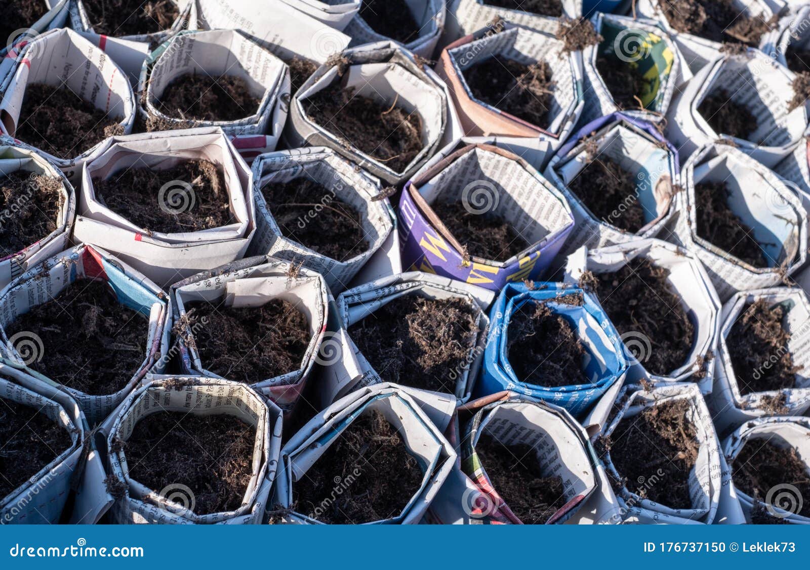 Homemade Biodegradable Newspaper Seed Starter Pots Containing Soil for ...