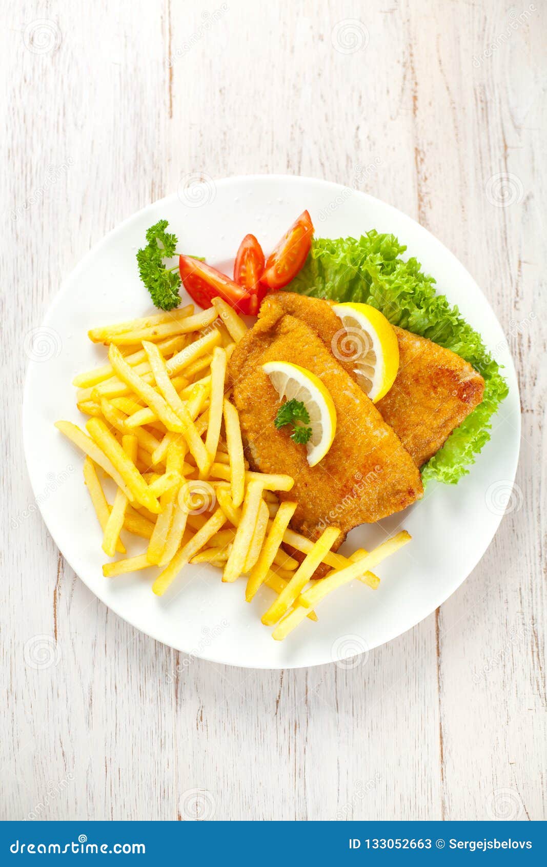 Homemade Breaded German Weiner Schnitzel with Potatoes. Stock Image ...