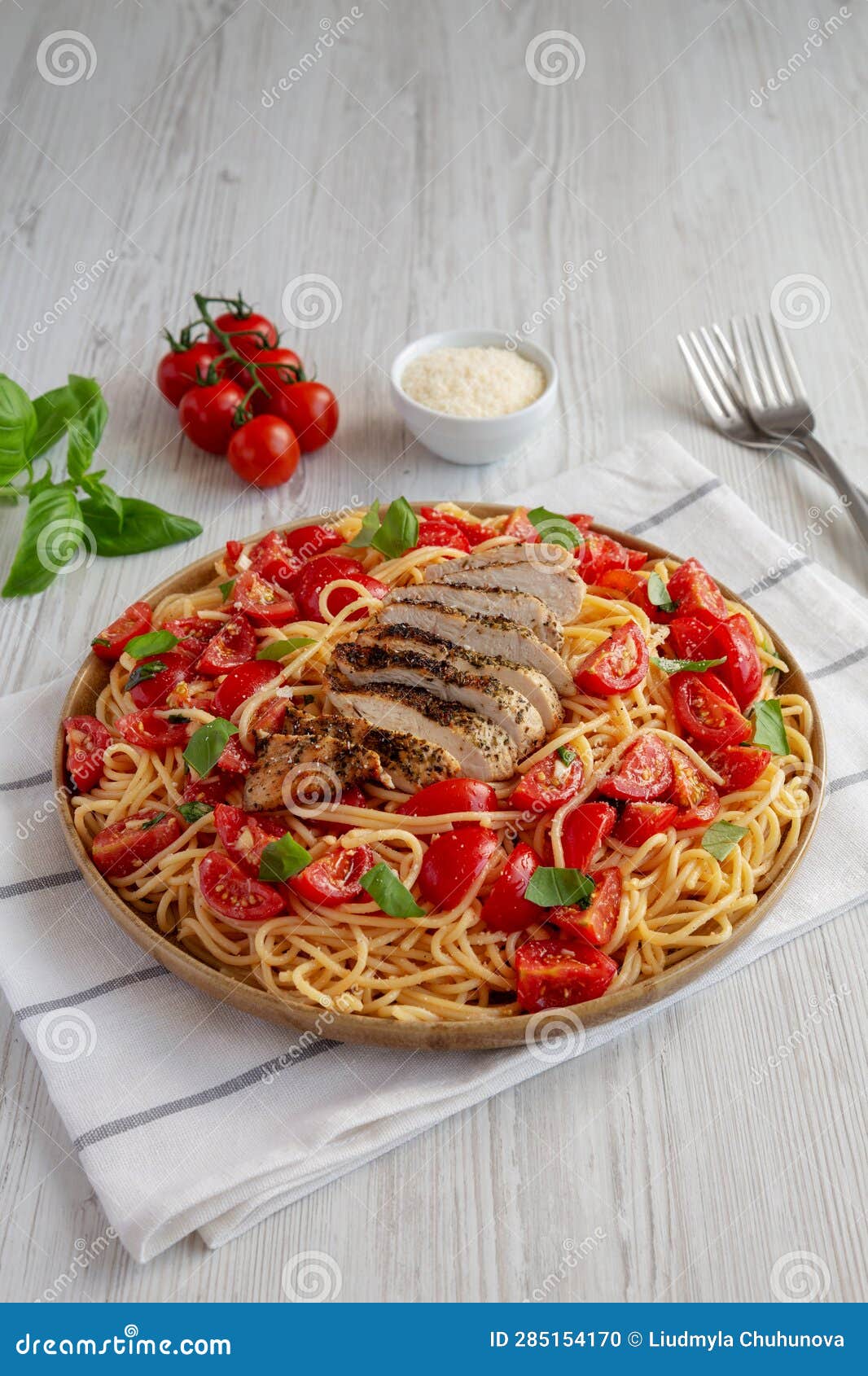 Homemade Bruschetta Chicken Pasta on a Plate, Side View Stock Photo ...