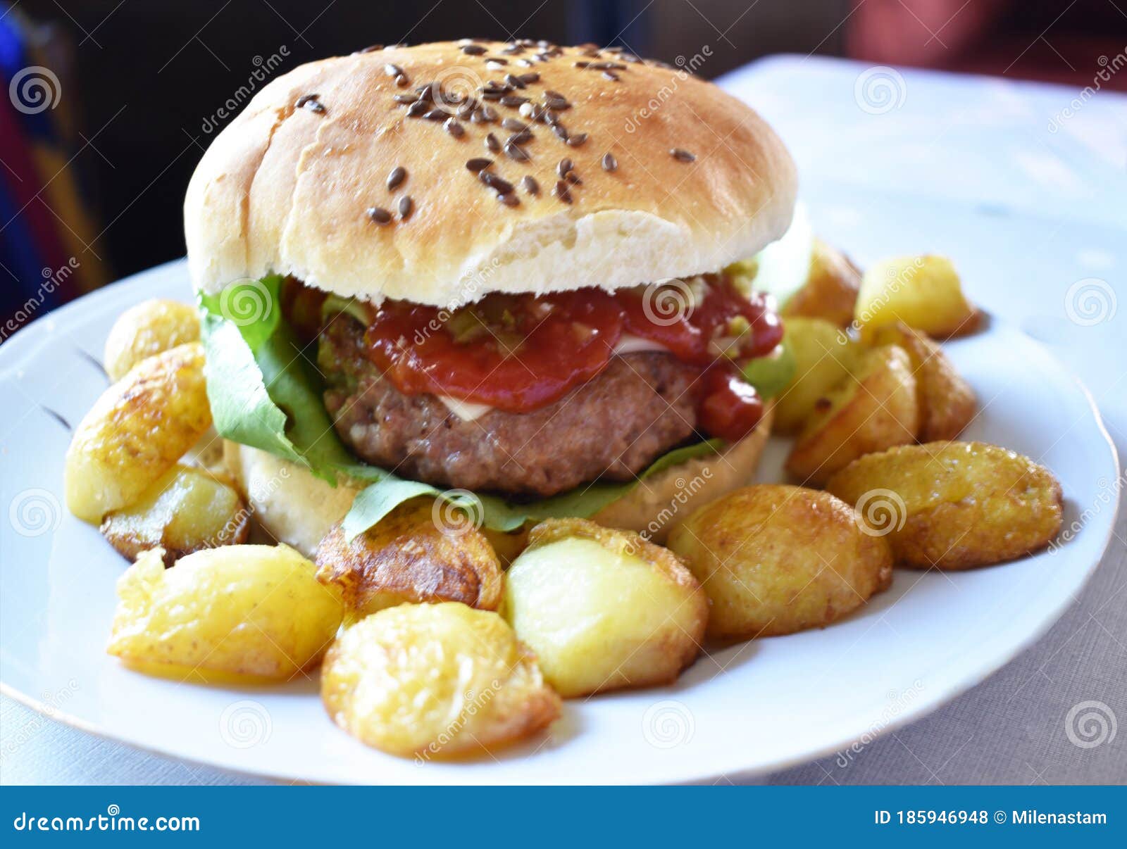 Homemade Cheeseburger with Potatoes Stock Photo - Image of brown ...