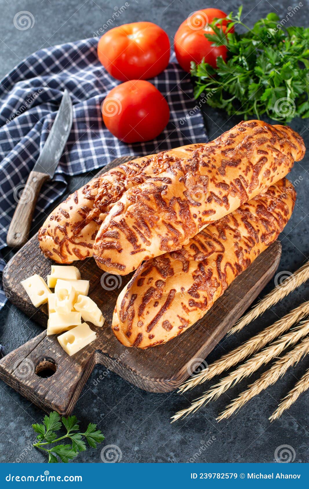 Homemade Cheesy Breadsticks on a Dark Background Stock Image - Image of ...