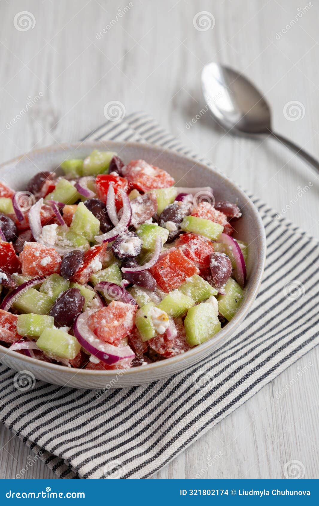 Homemade Chopped Mediterranean Salad in a Bowl, Side View Stock Photo ...