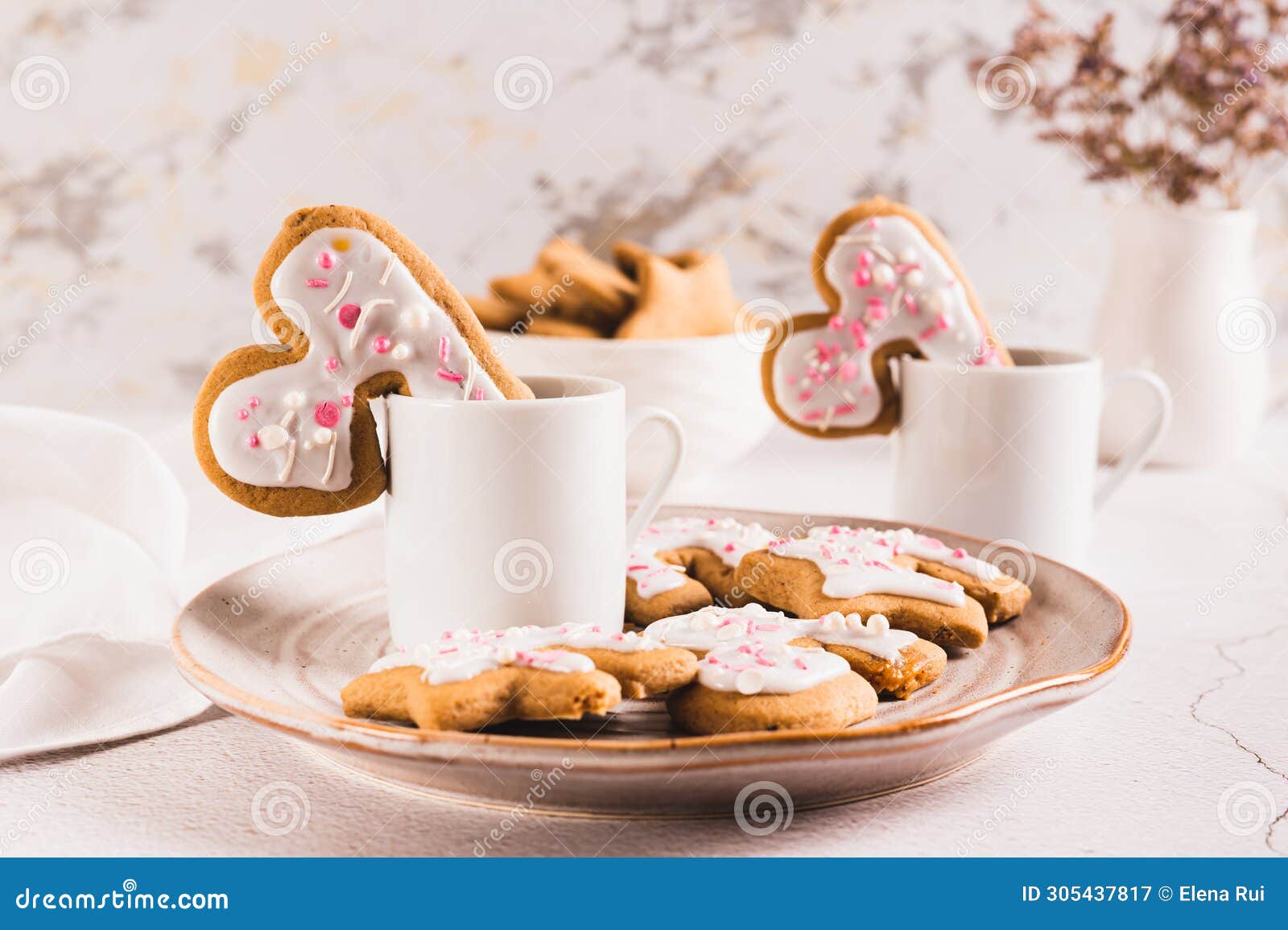 Homemade Cookies Hugging a Coffee Mug on a Plate on the Table Stock ...
