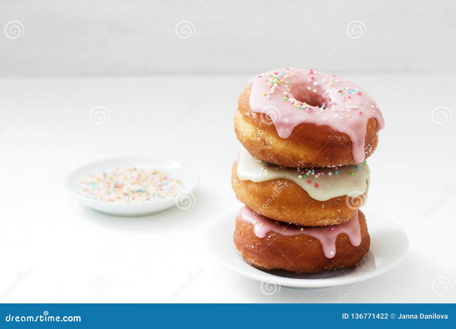 Homemade Donuts Decorated with Colored Icing and Colored Sugar on a ...