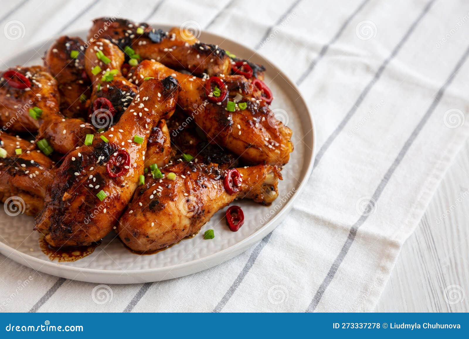 Homemade Easy Sticky Chicken Drumsticks on a Plate, Side View Stock ...