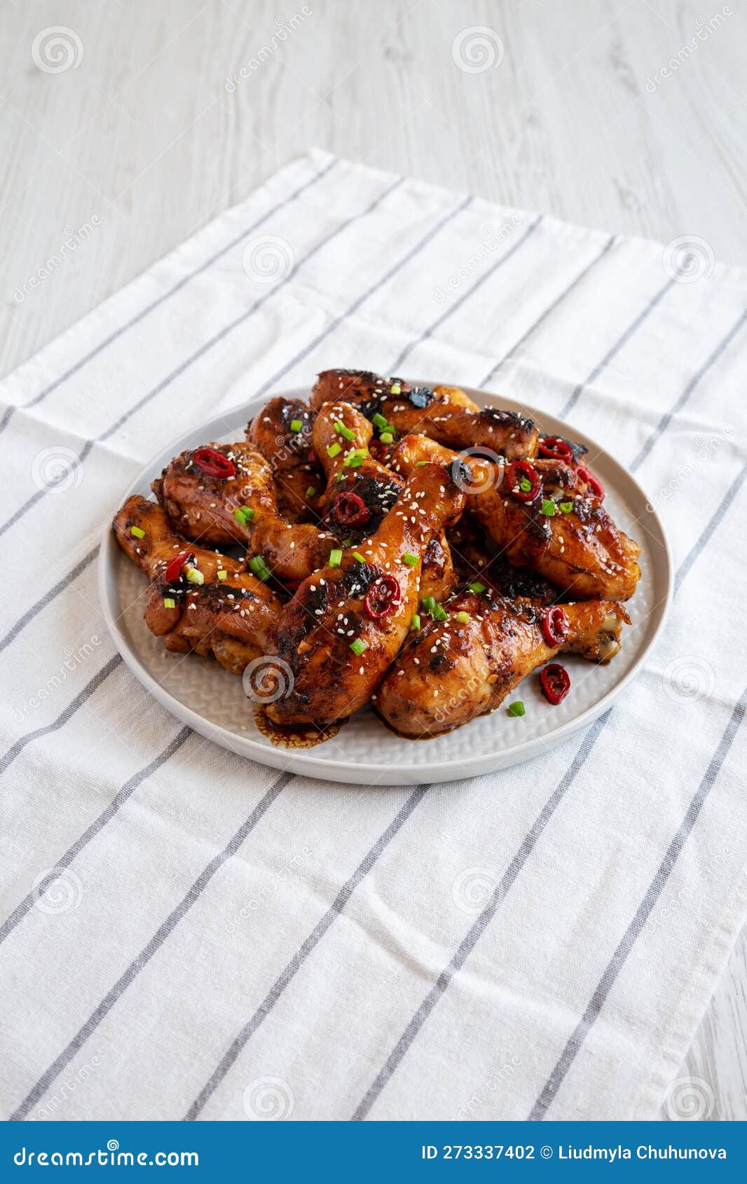 Homemade Easy Sticky Chicken Drumsticks on a Plate, Side View Stock ...