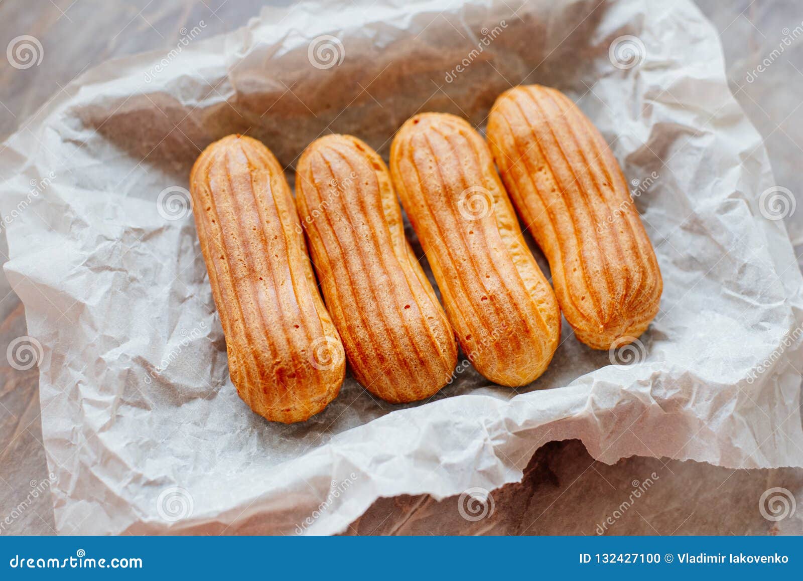 Homemade Eclairs. Preparation of Eclairs in the Home Kitchen Stock ...