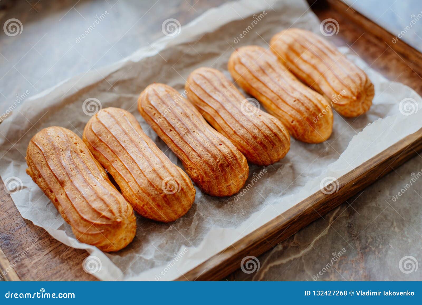 Homemade Eclairs. Preparation of Eclairs in the Home Kitchen Stock ...