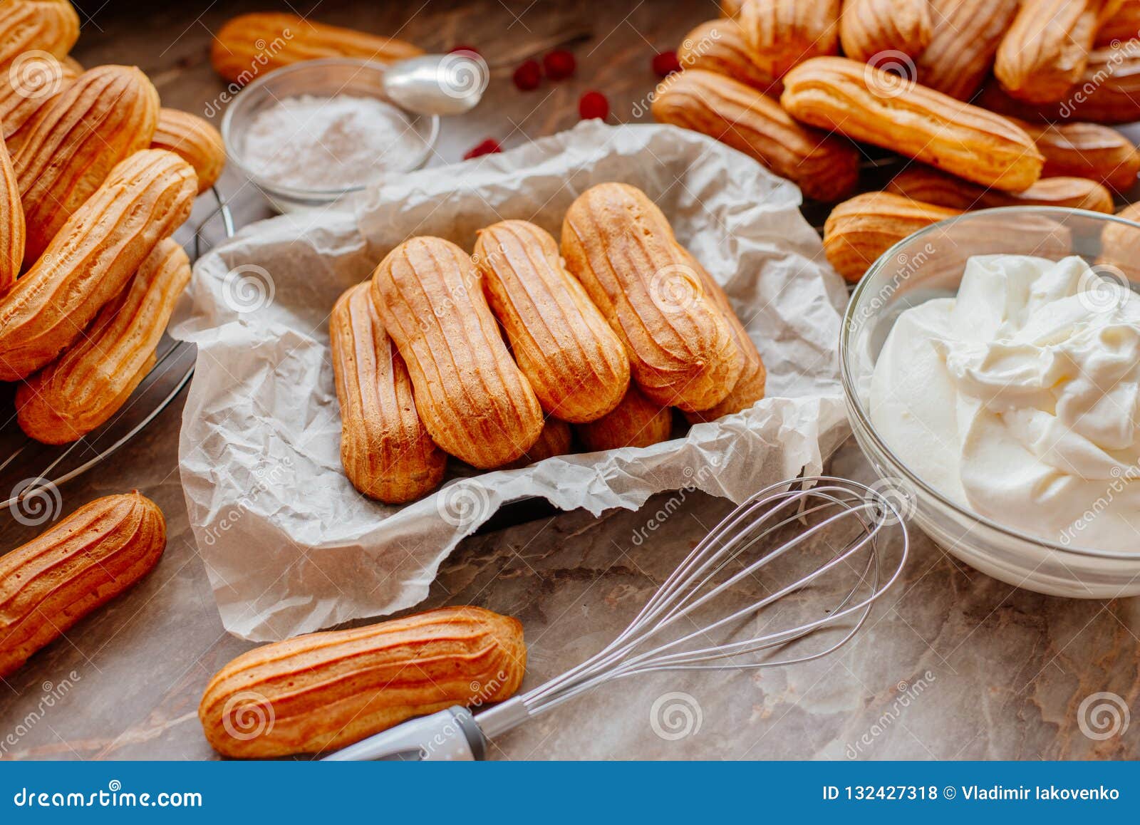 Homemade Eclairs. Preparation of Eclairs in the Home Kitchen Stock ...