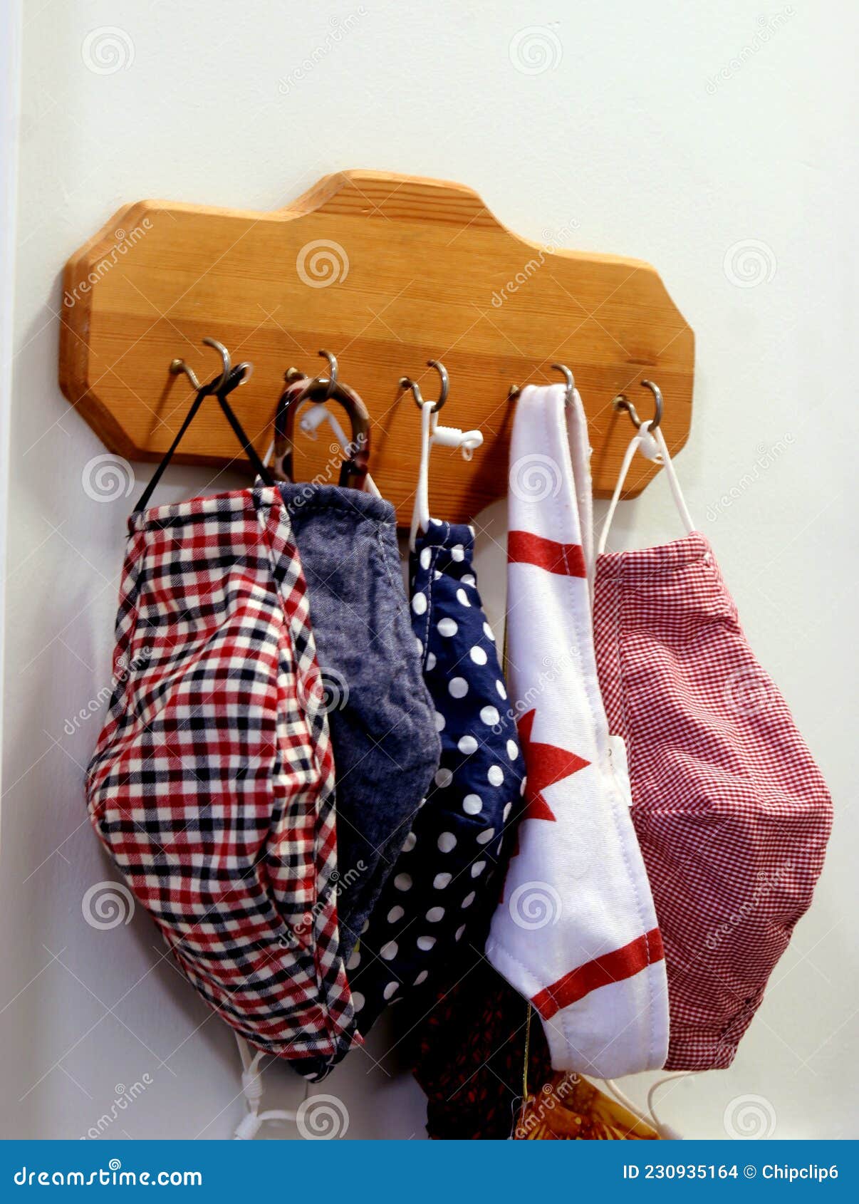 Homemade Face Masks of Different Designs Hanging in Home Stock Photo ...